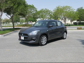 Suzuki Swift Grey Hatchback For Rent in Qatar