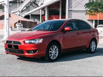Mitsubishi Lancer Maroon Sedan For Rent in Qatar