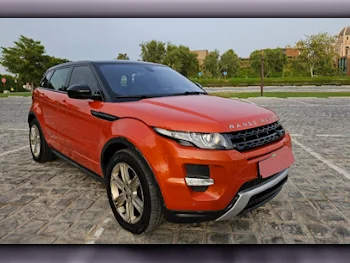 Land Rover Evoque Dynamic Orange 2015 For Sale in Qatar