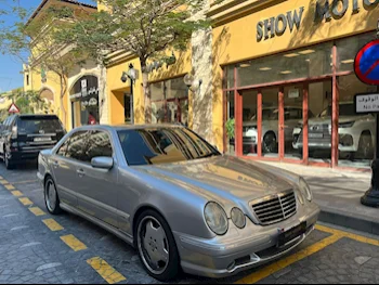 Mercedes-Benz E-Class 55 AMG Silver 2000 For Sale in Qatar