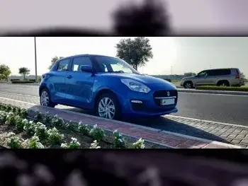 Suzuki Swift Hatchback Blue For Rent in Qatar