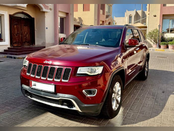 Jeep Grand Cherokee Limited Maroon 2016 For Sale in Qatar