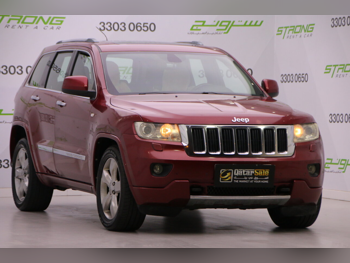 Jeep Grand Cherokee Maroon 2013 For Sale in Qatar