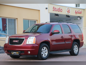 GMC Yukon Maroon 2009 For Sale in Qatar