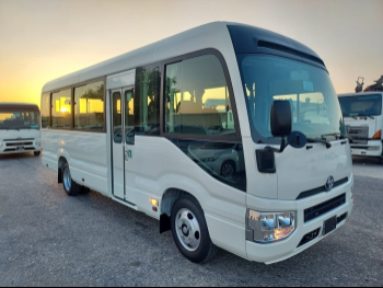 Toyota Coaster BUS White For Rent in Qatar