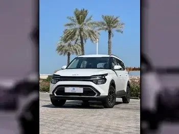 Kia Carens White 2x4 For Rent in QAR